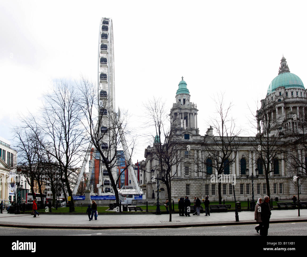Belfast City Hall with the Belfast eye 200ft talll known as the Wheel ...