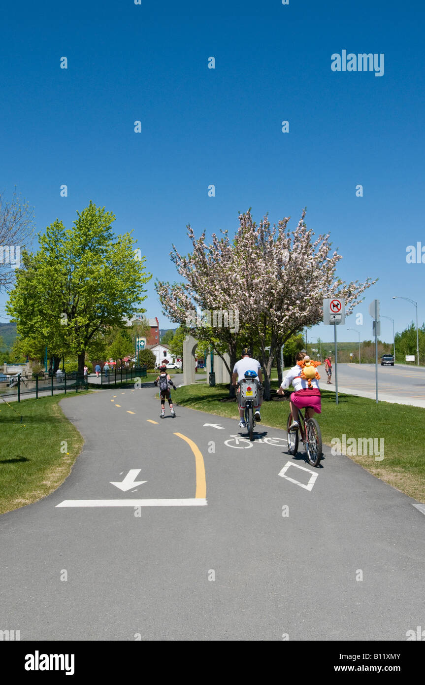 Cycling path next to lake Memphremagog Eastern townships Quebec Canada ...