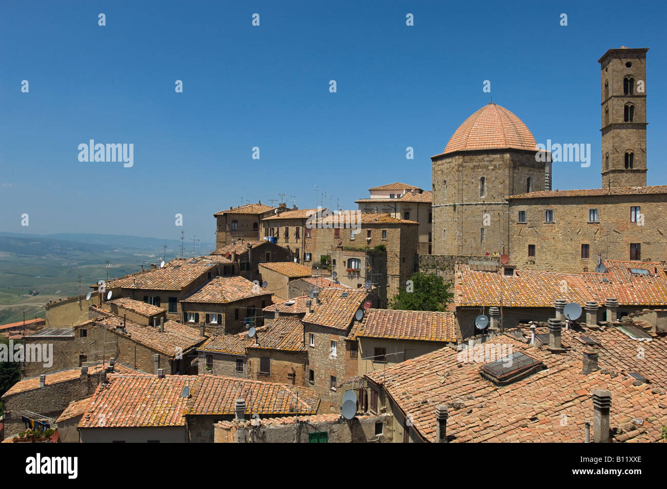 A view of Volterra including the Cathedral Tower and Baptistry, Tuscany ...