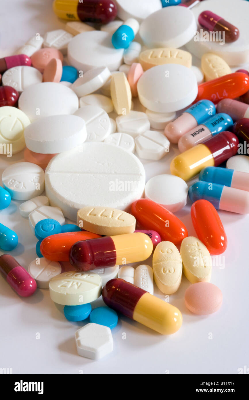 A selection of colourful tablets and capsules Stock Photo - Alamy