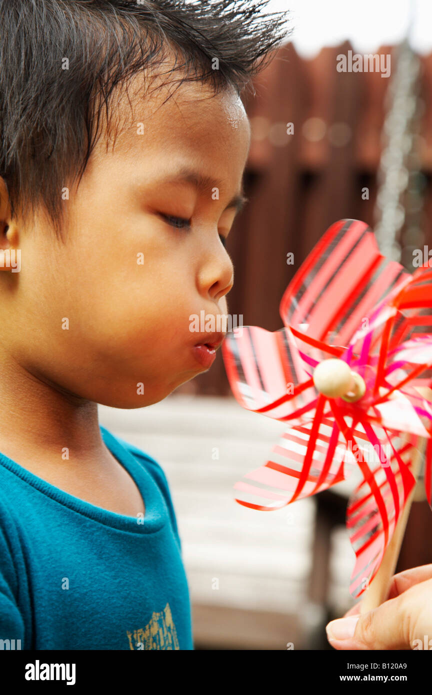 Asian boy holding pinwheel hi-res stock photography and images - Alamy Asian boy holding pinwheel hi-res stock photography and images - Alamy