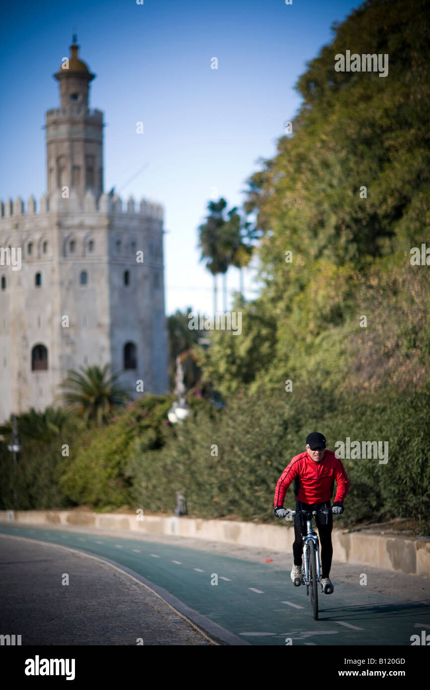 Person riding bike uphill hi-res stock photography and images - Alamy