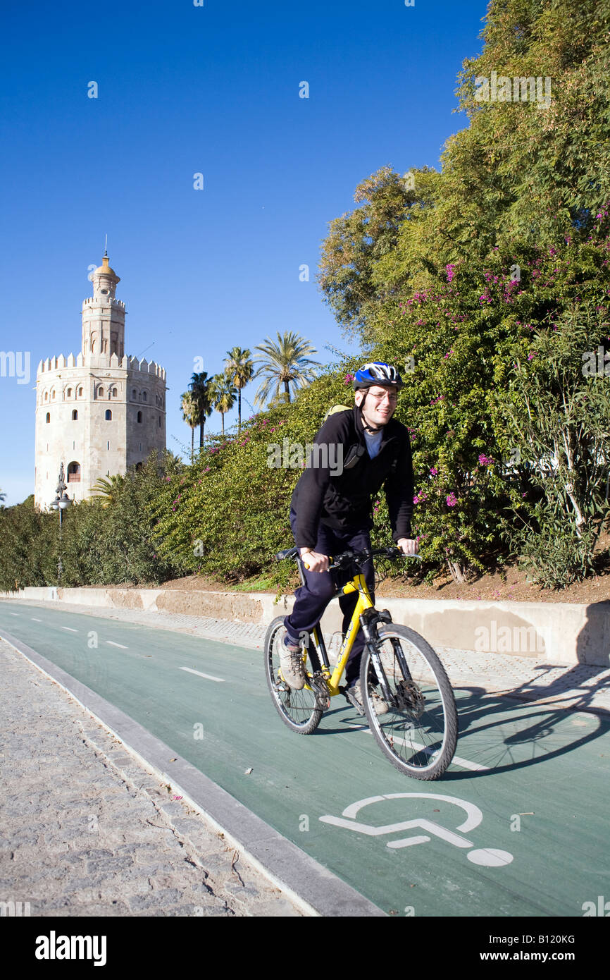 Person riding bike uphill hi-res stock photography and images - Alamy