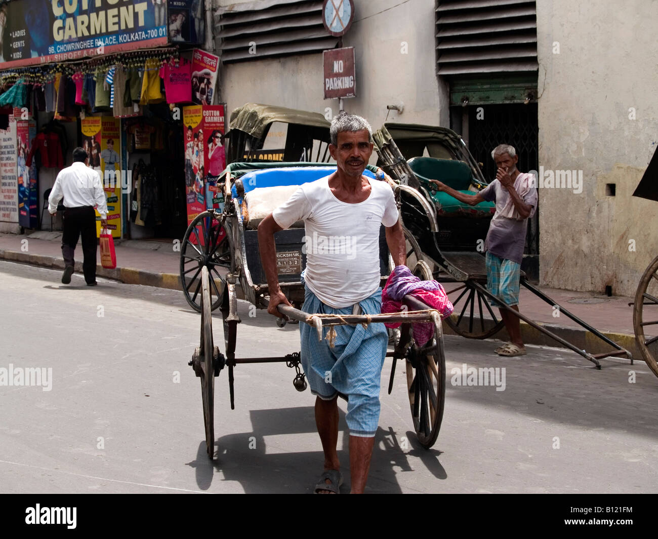 Indian pulling rickshaw hi-res stock photography and images - Alamy