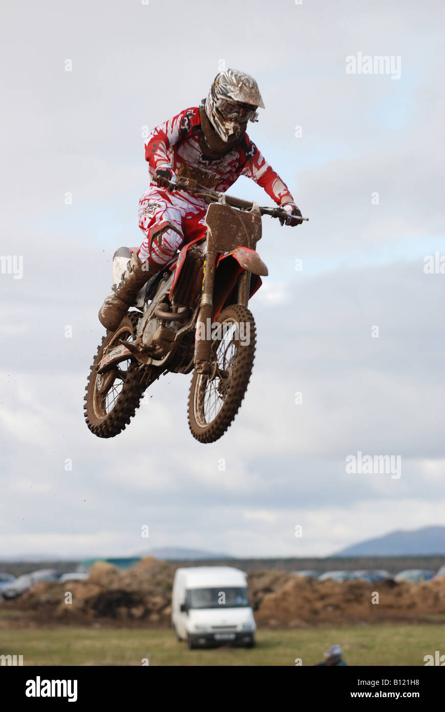 Competitor airborne at Scottish Adult Open MotoCross Championship Tain ...