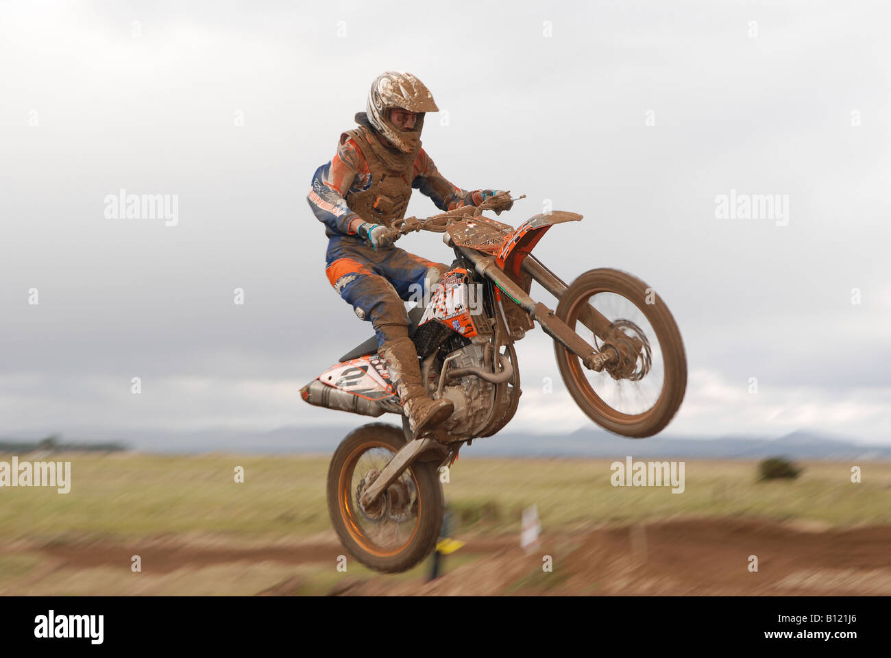 Competitor airborne at Scottish Adult Open MotoCross Championship Tain ...