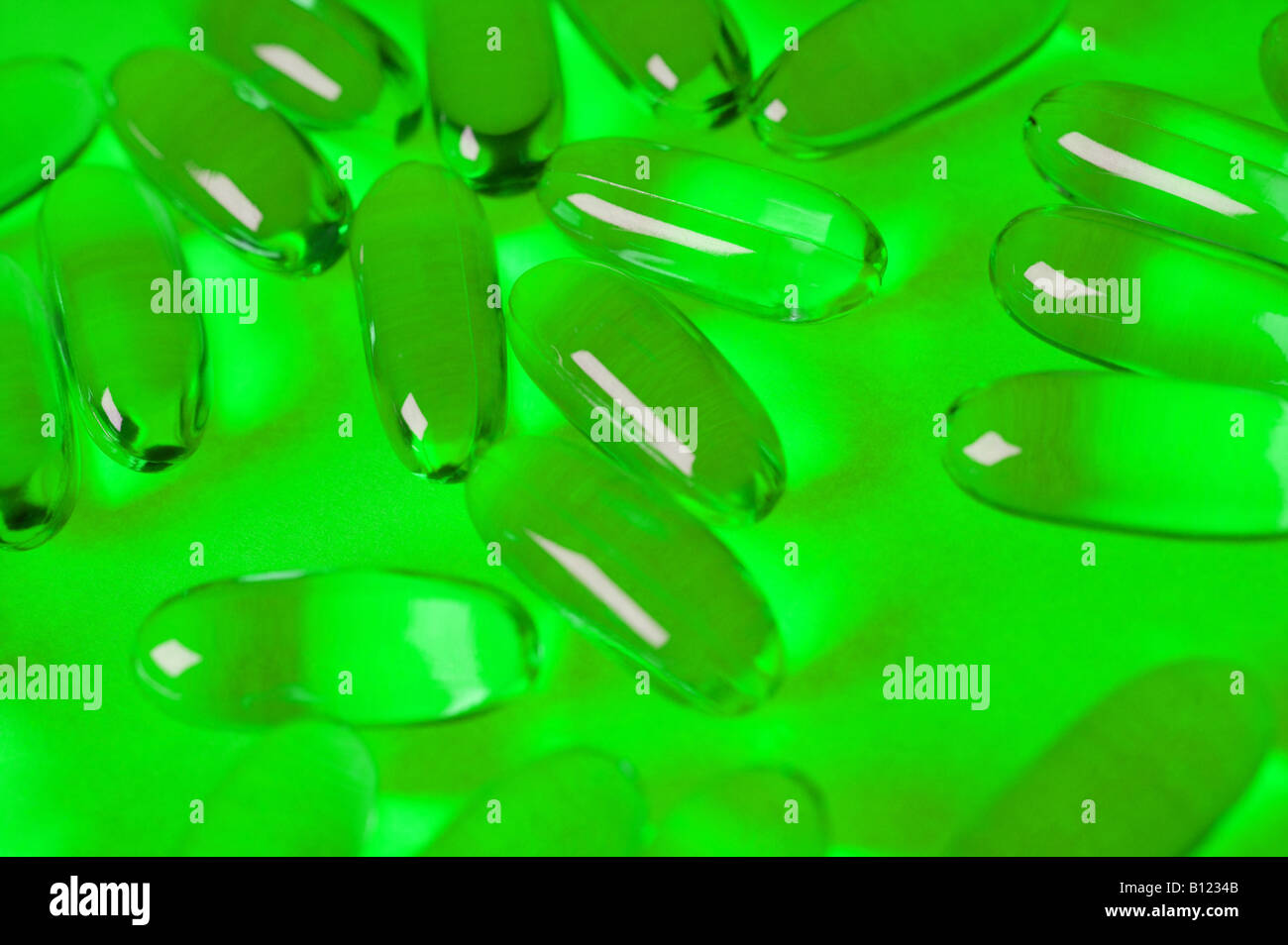 Close up of pharmaceutical drugs on green background Stock Photo - Alamy