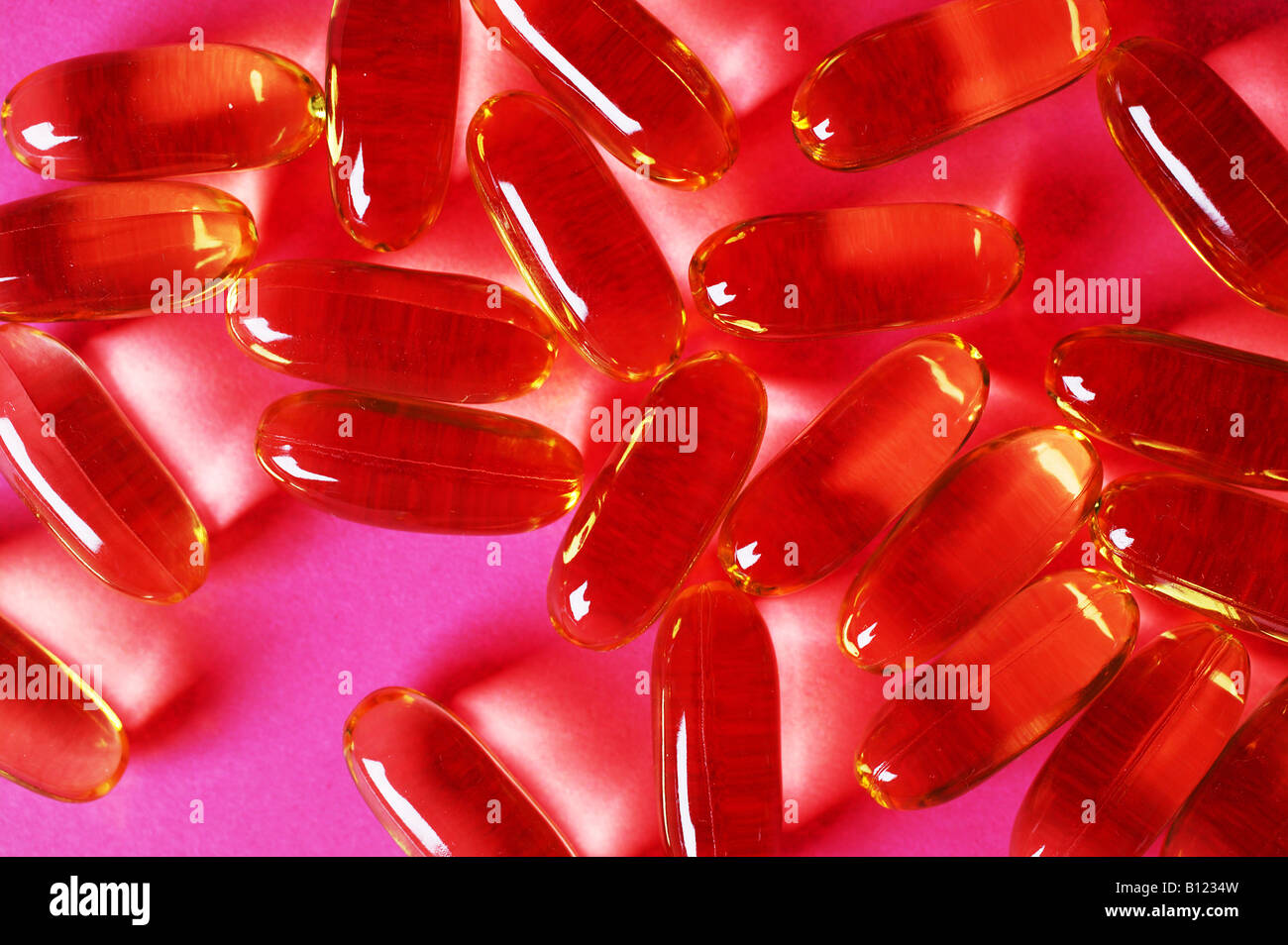 Close up of pharmaceutical drugs on pink background Stock Photo - Alamy