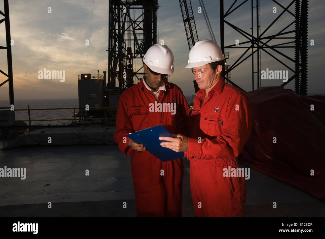 2 workers on Ensco rig. Natuna Field. Sea South China Sea. Indonesia ...