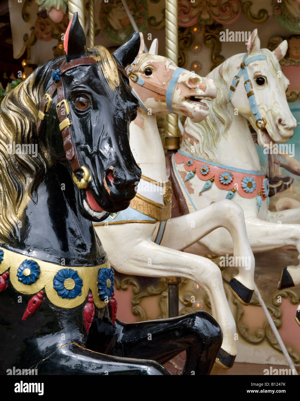 Rides on carousel in city park Stock Photo - Alamy