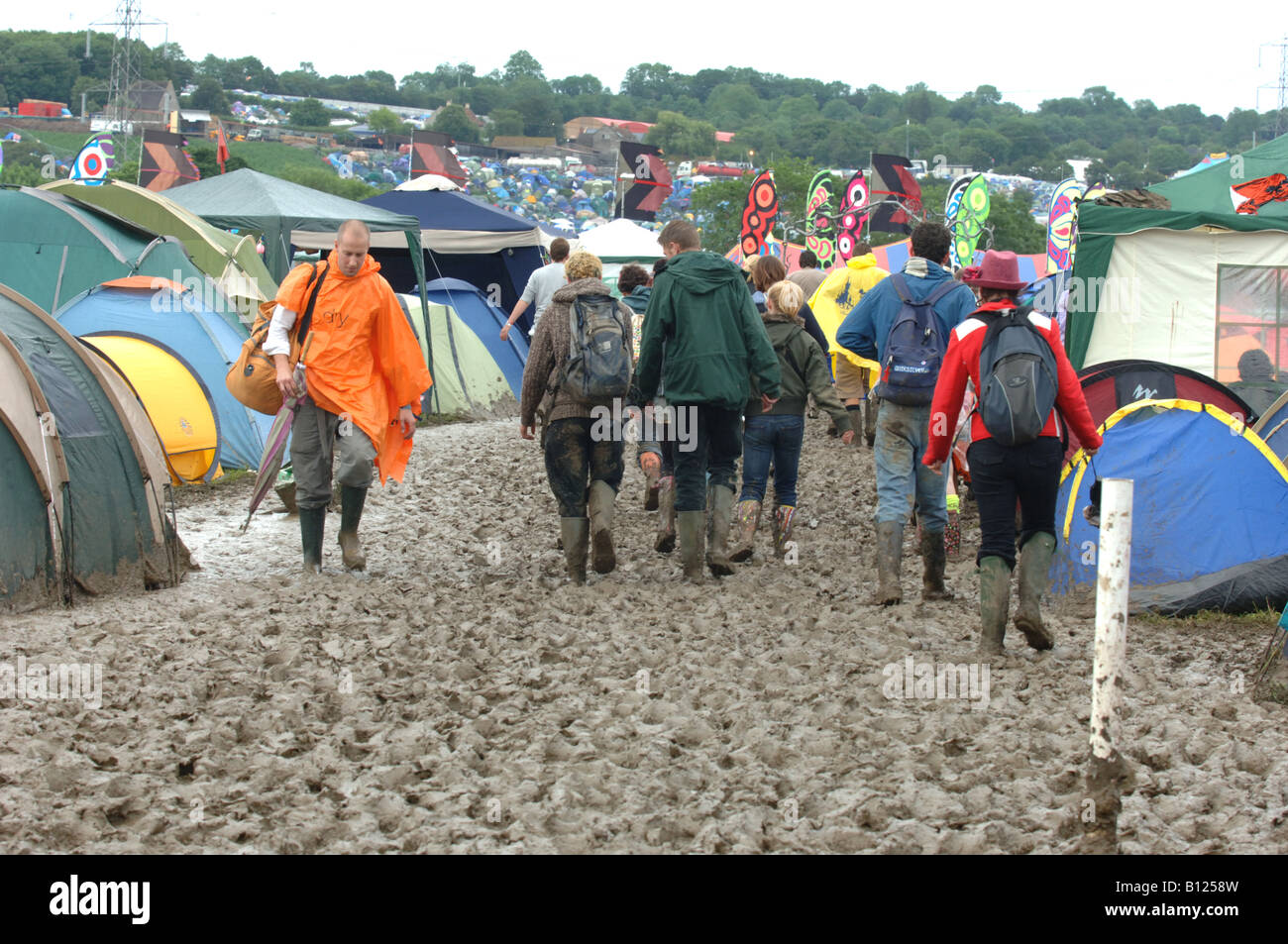 Glastonbury Music Festival wet and muddy campsite Stock Photo - Alamy