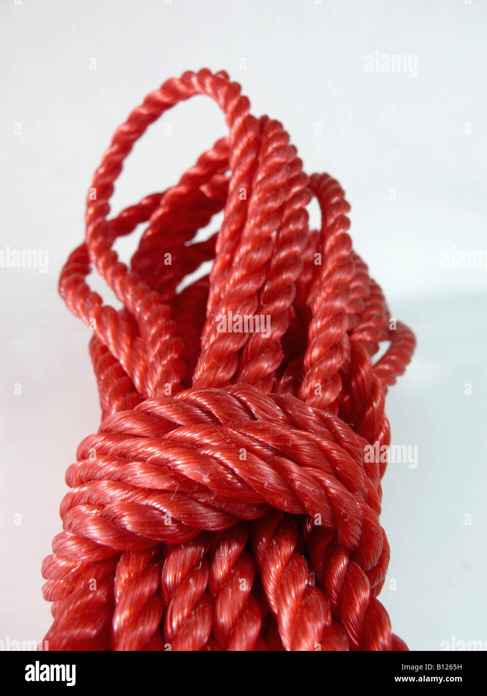 braided red nylon heavy duty commercial rope Stock Photo - Alamy
