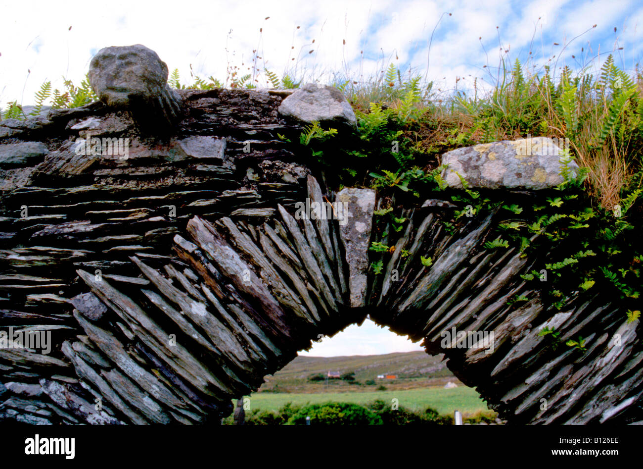 Dry stone wall arch England Stock Photo - Alamy