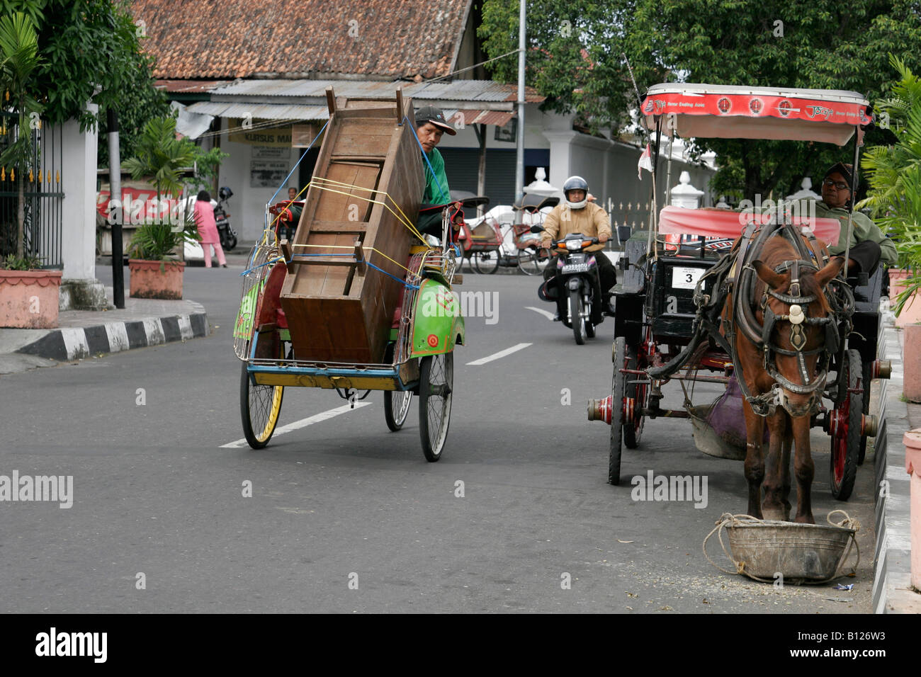 Becaks (rickshaw) on the street of Yogyakarta, Java, Indonesia, Asia ...