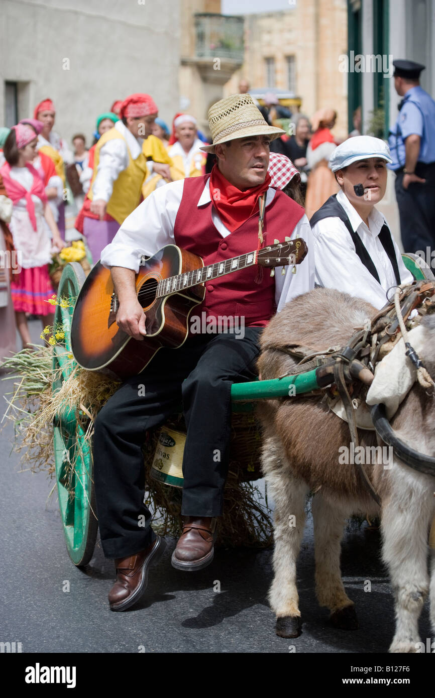 Folk Group Procession Through the town of Victoria Gozo Malta Stock ...