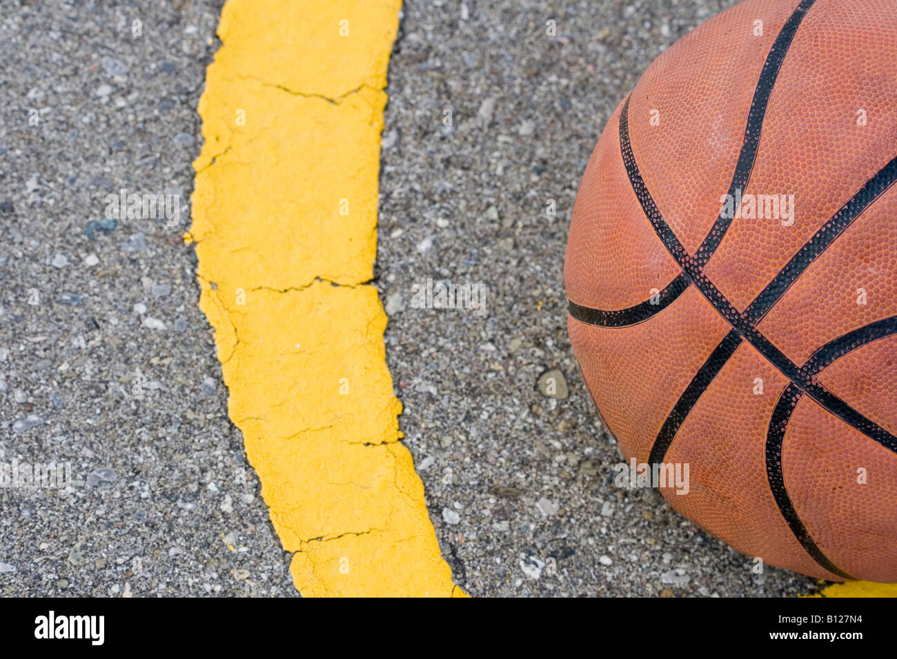 Basketball on streetball court Stock Photo - Alamy