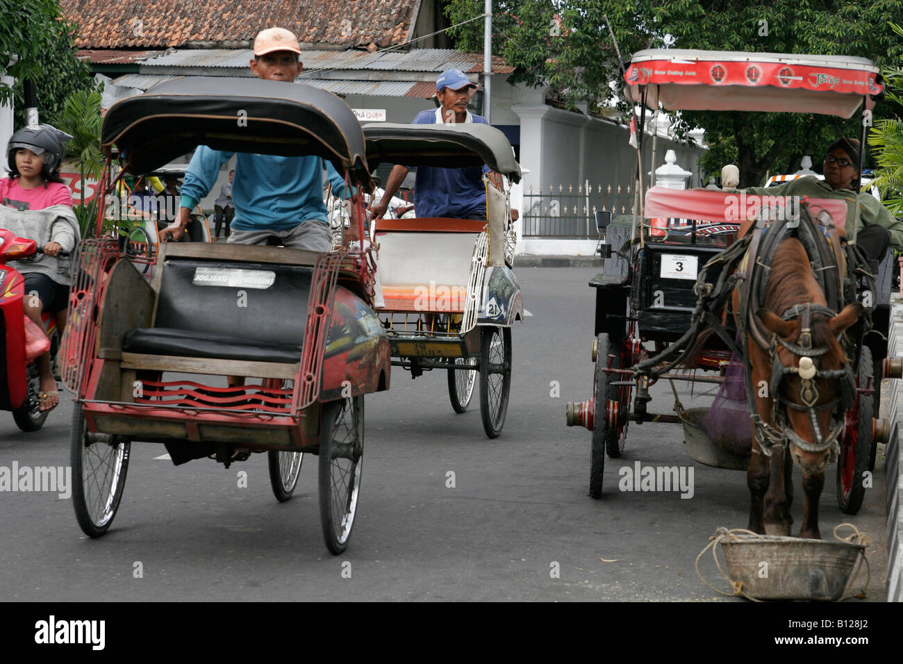 Becaks (rickshaw) on the street of Yogyakarta, Java, Indonesia, Asia ...