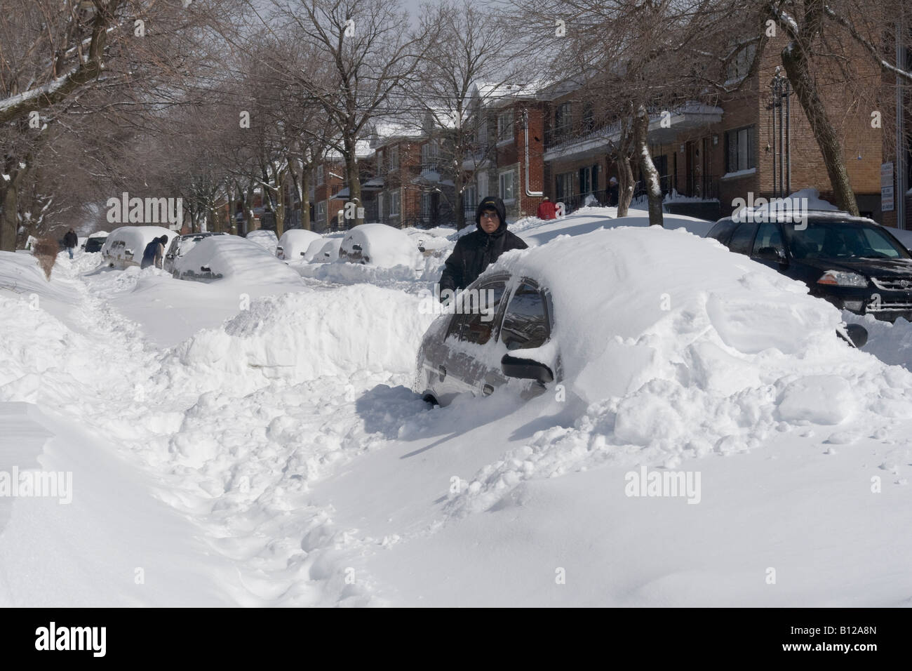 A scene along snow bound Montreal suburban street after a heavy snow ...