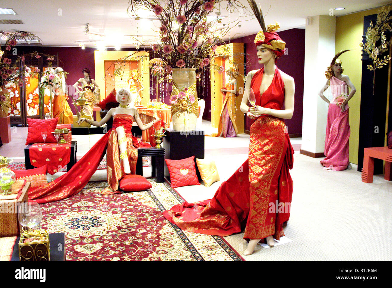 Batik and songket fashion display in shop Stock Photo - Alamy