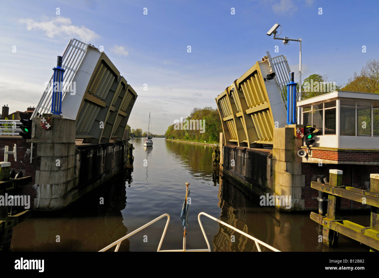 Bridge opening for boat Holland Europe Stock Photo - Alamy