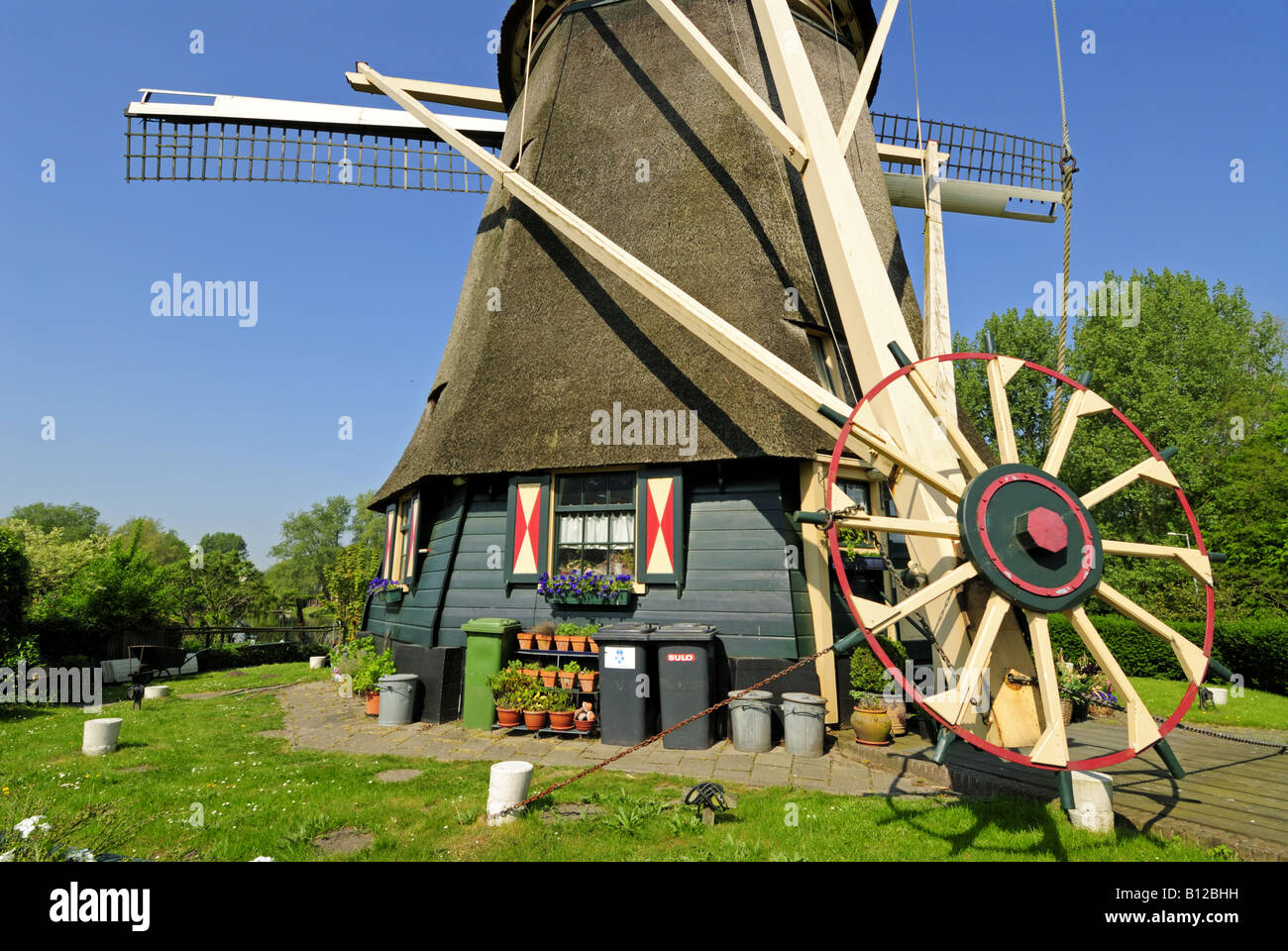 Traditional Dutch windmills along canals Holland Europe Stock Photo - Alamy
