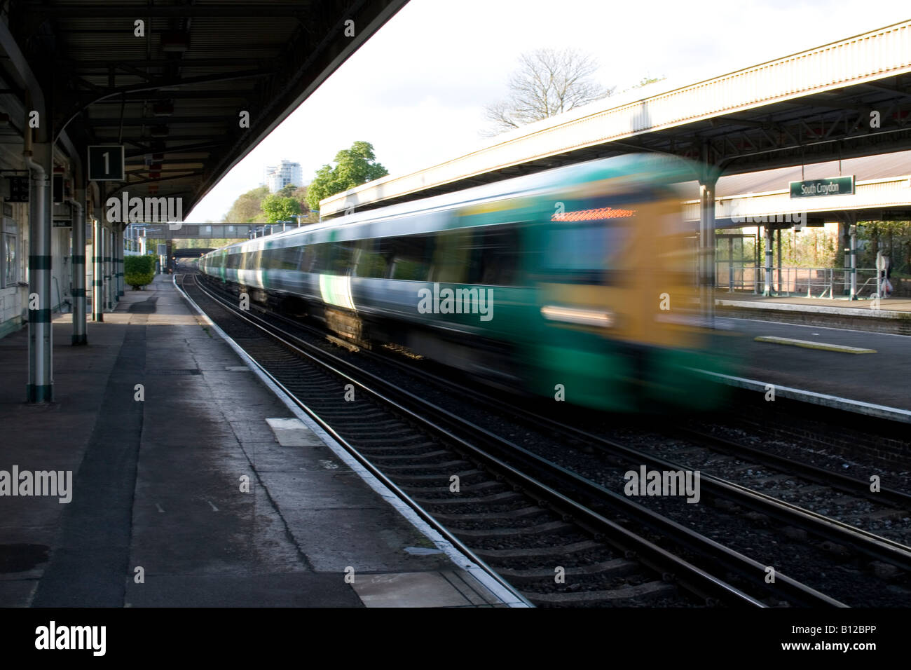 A train rushes passed Stock Photo - Alamy