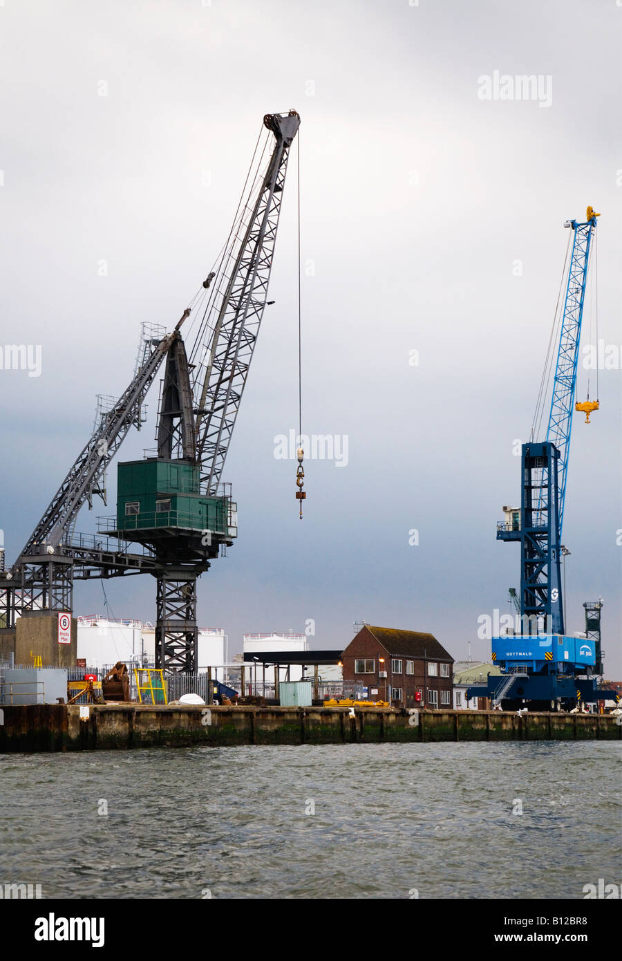 A view of cranes on Poole docks. Poole harbour, Dorset. UK Stock Photo ...