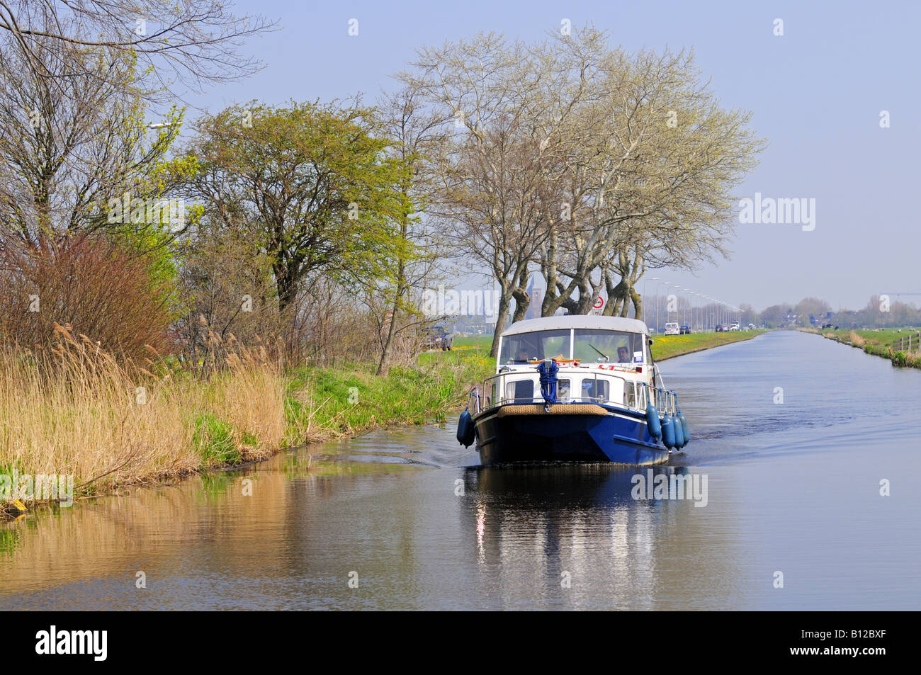 Yacht on Dutch canal Holland Europe Stock Photo - Alamy