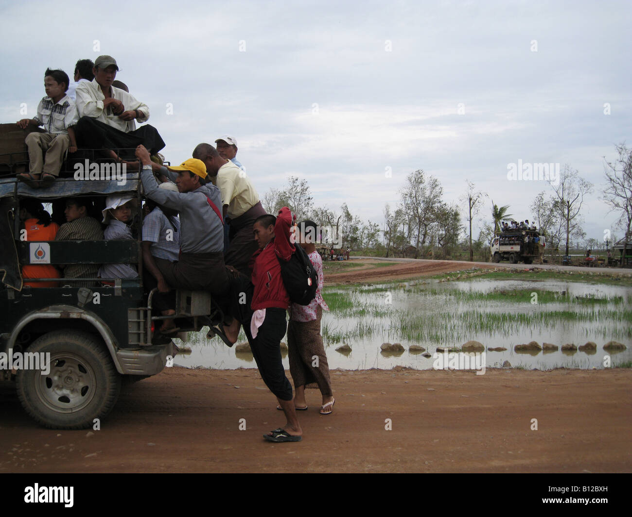 Crowded car carrying Cyclone Nargis survivors on their way to Yangon ...