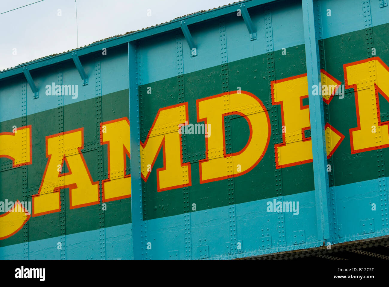 Camden lock sign painted on a railway bridge that passes over Camden ...