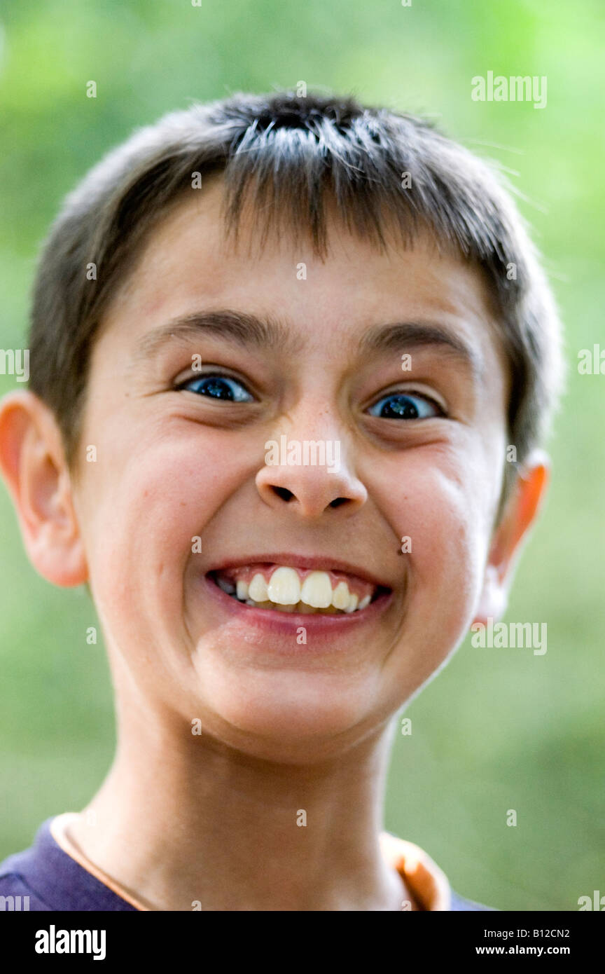 Close up of a young boy s face wearing an odd expression Stock Photo ...