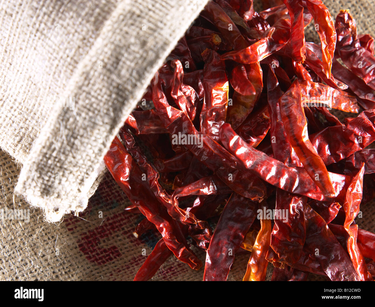 Dried chilis in a sack Stock Photo - Alamy