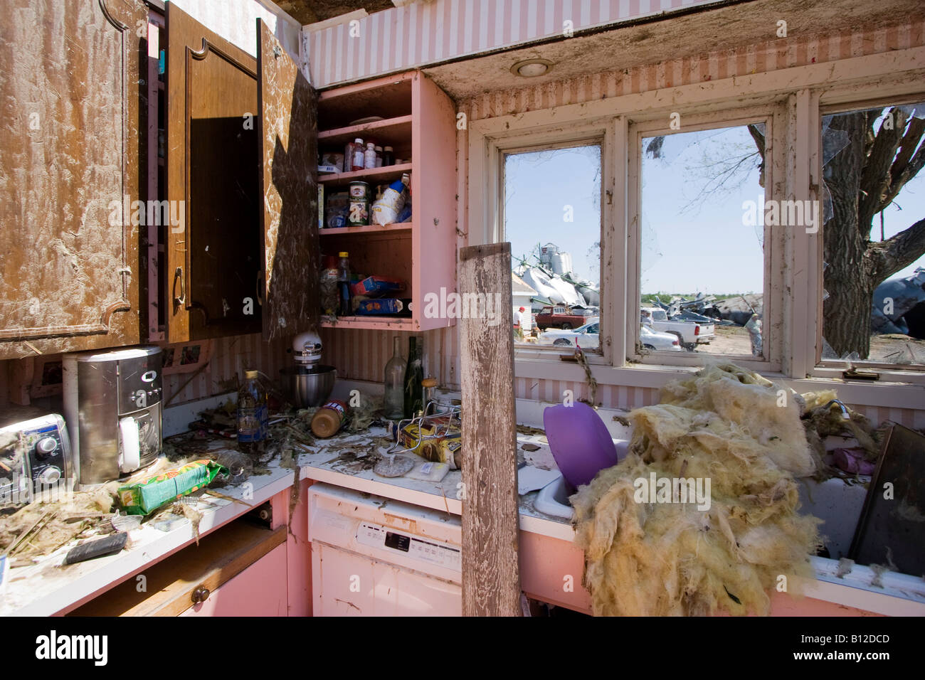 A kitchen destroyed by a tornado in Aurora, Nebraska, USA Stock Photo ...