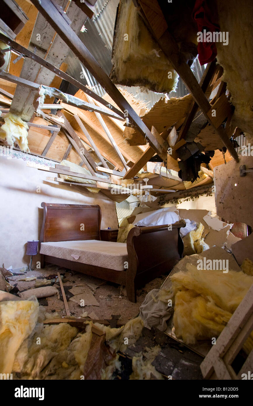 A bedroom destroyed by a tornado in Aurora, Nebraska, USA Stock Photo ...