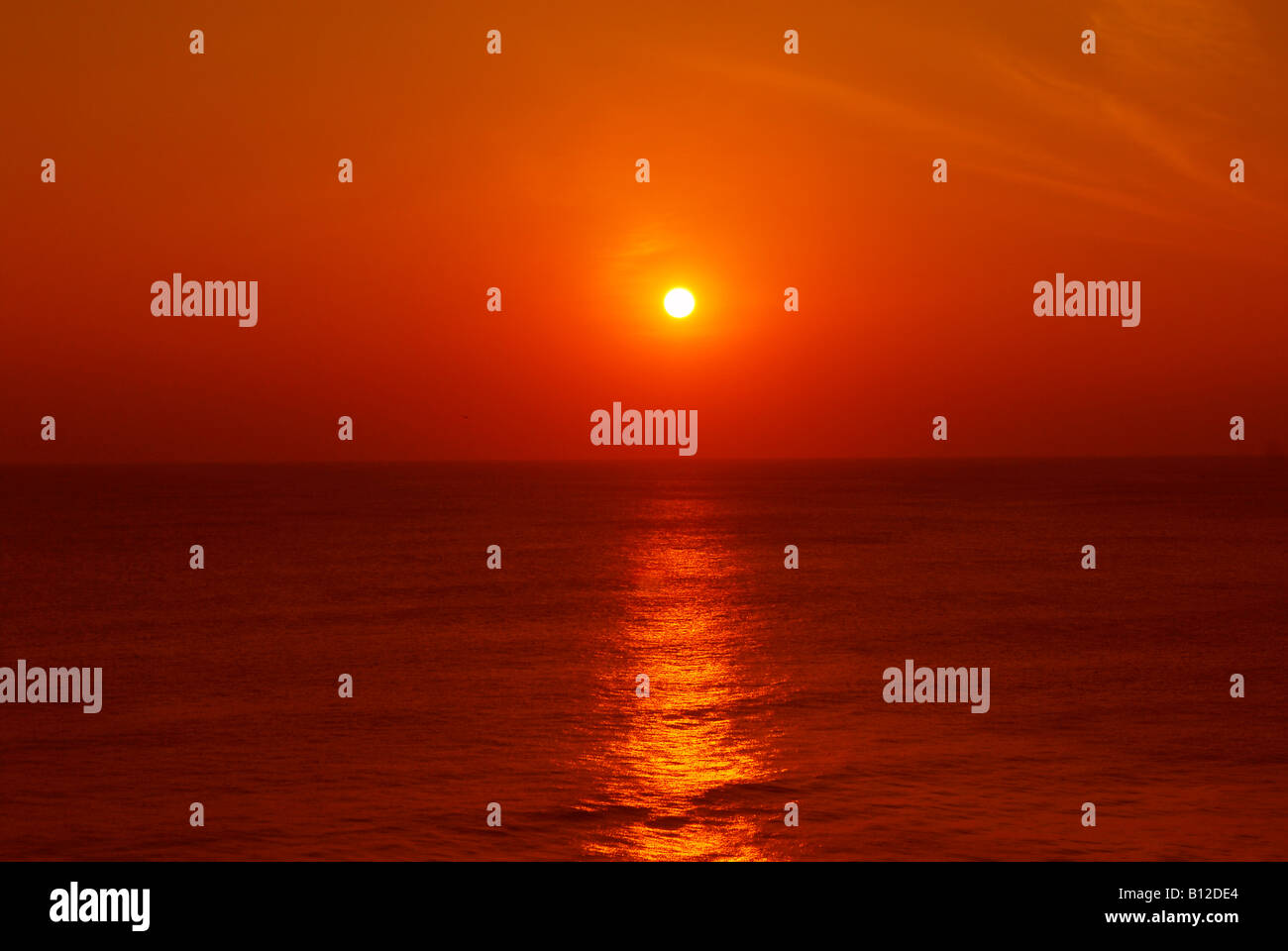 Sunset at Kerala beach Stock Photo - Alamy