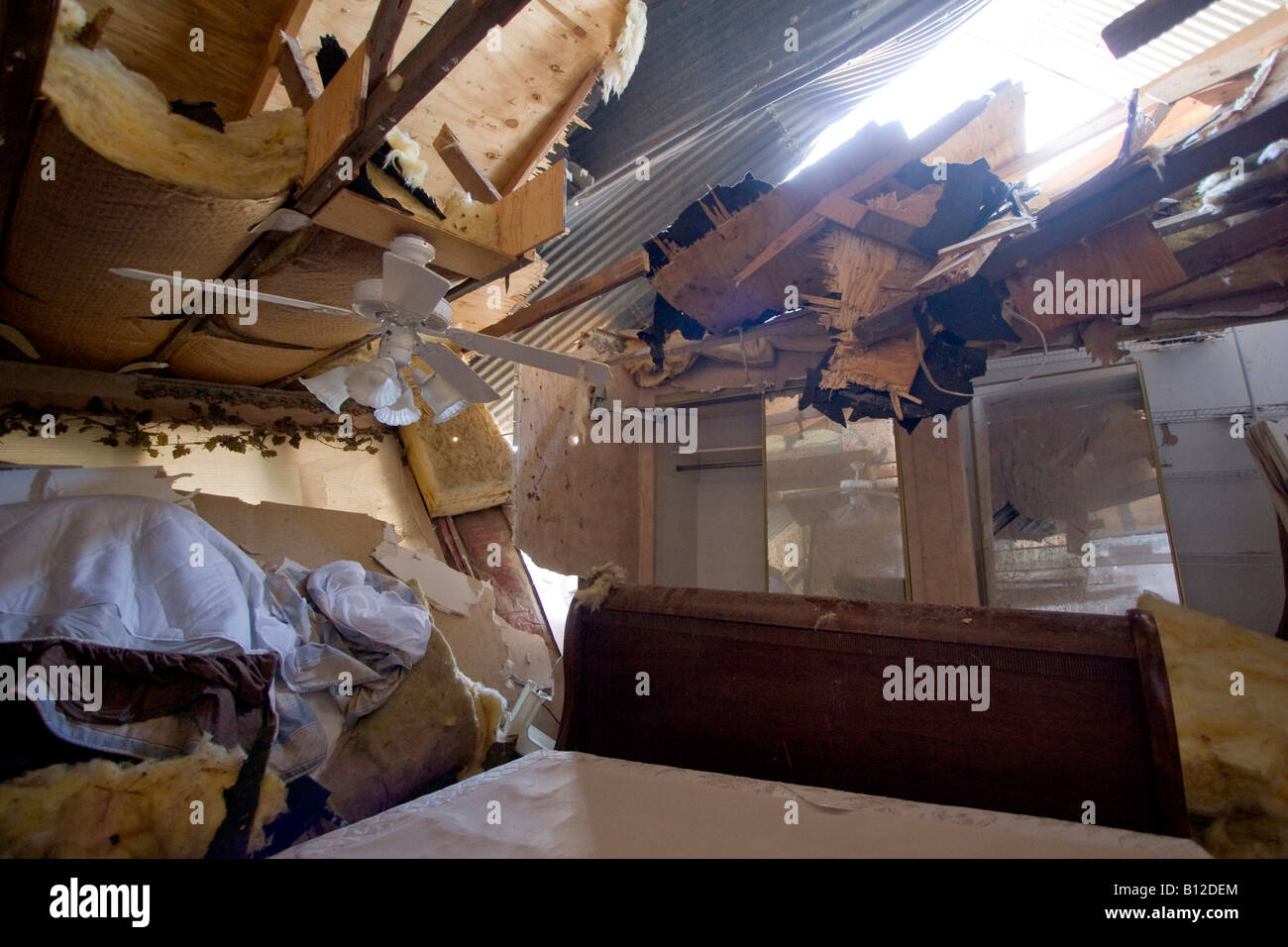 A bedroom destroyed by a tornado in Aurora, Nebraska, USA Stock Photo ...