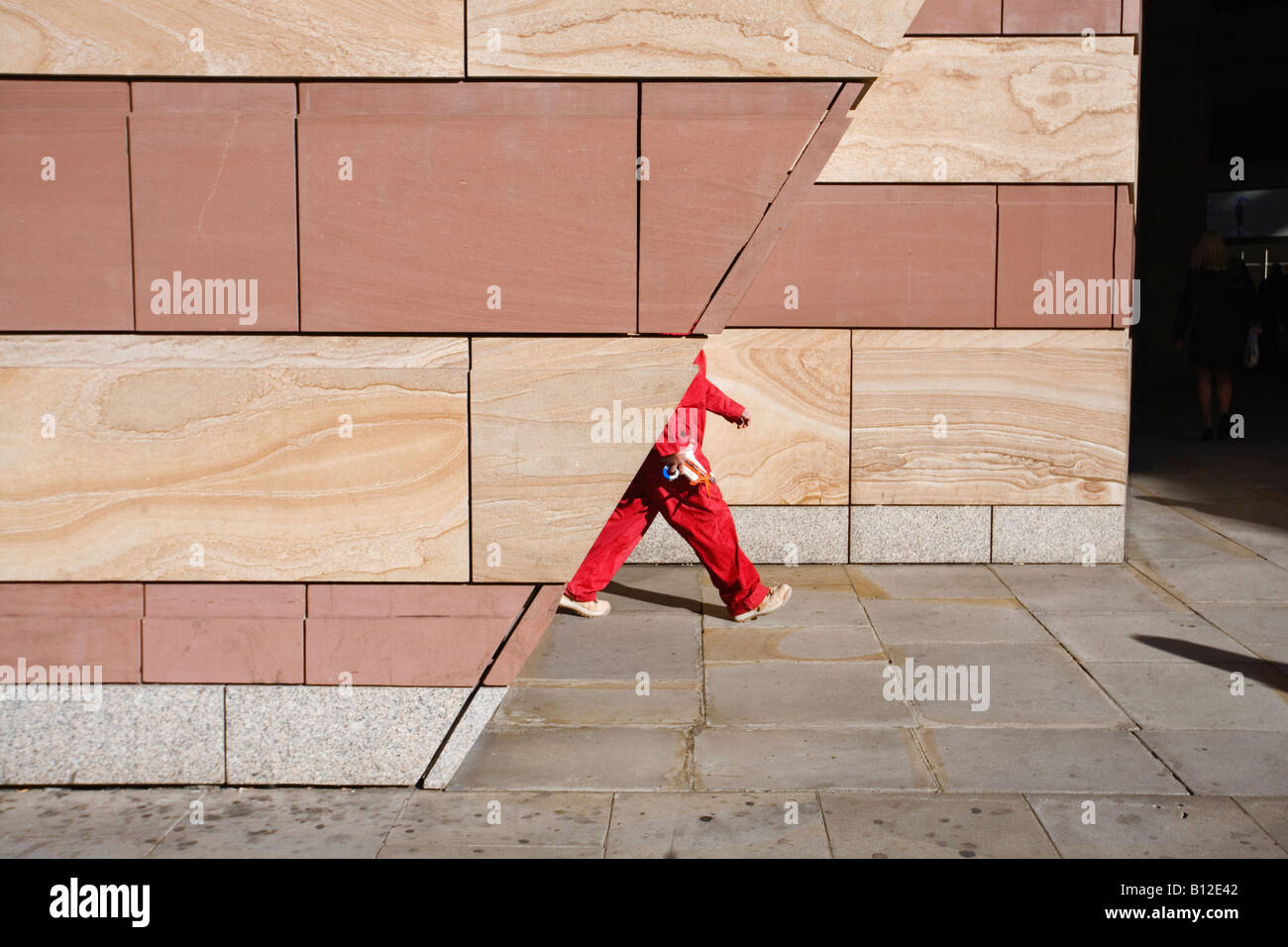 a man walking through an arcade in the city of london Stock Photo - Alamy