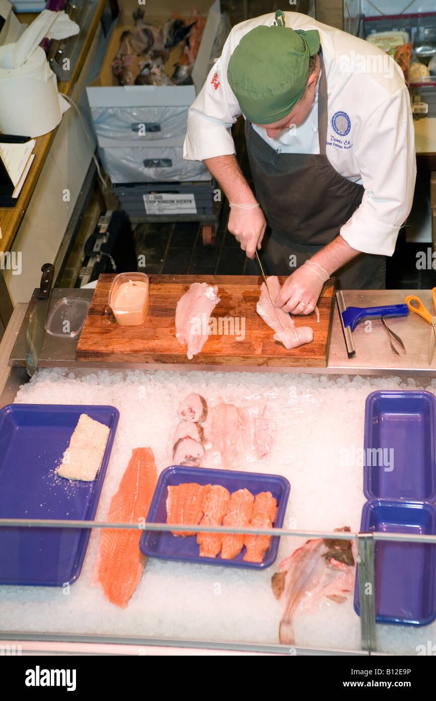 A fishmonger works at his desk at Gothenburg s famous fish market ...