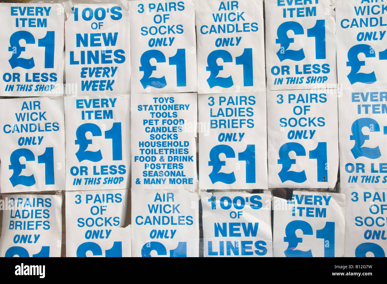 Pound sign £1 stickers posters advertising in bargain discount goods ...