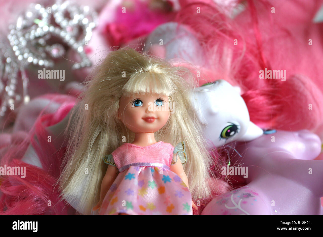 Girls pink dolls hi-res stock photography and images - Alamy