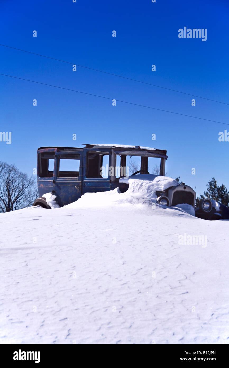 Old car in a snow Stock Photo - Alamy