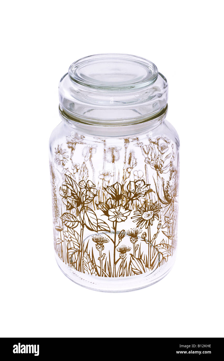 Empty glass jar with floral design on white background Stock Photo - Alamy