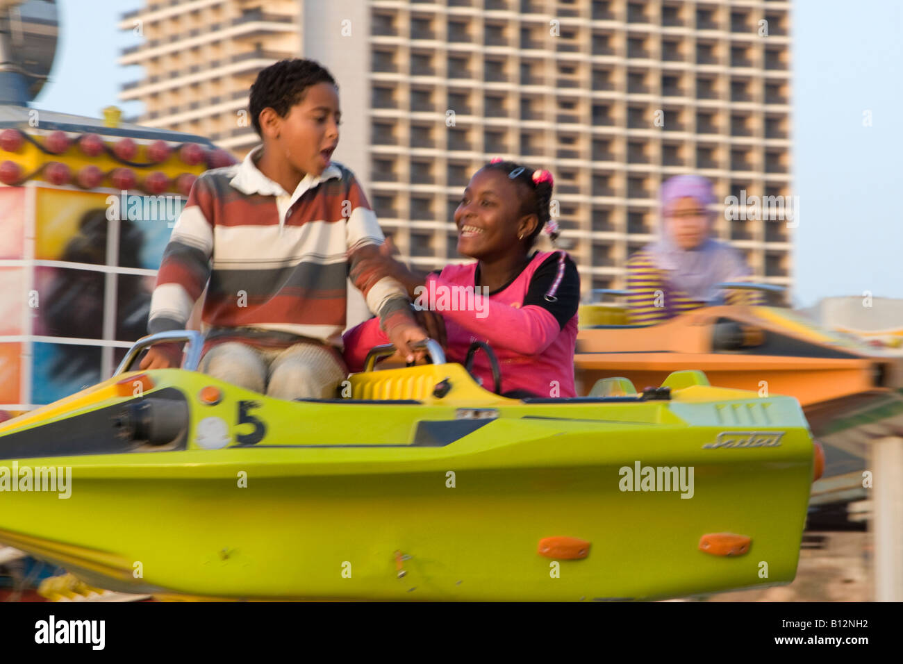 Tripoli, Libya, North Africa. Libyan Children on Amusement Park Ride ...