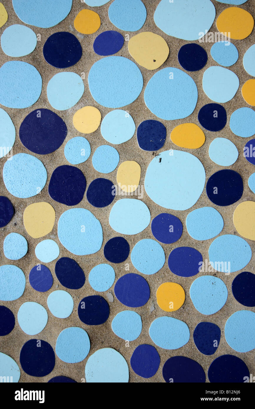 COLOURED TILE FRAGMENTS SET IN CONCRETE VERTICAL BDB11455 Stock Photo ...