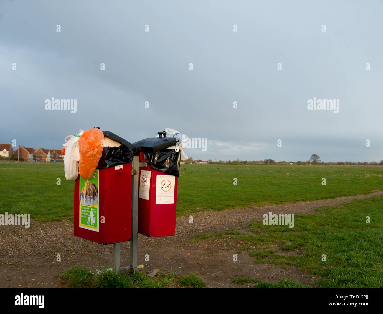 Over Flowing Dog Poo Collection Bin Stock Photo - Alamy