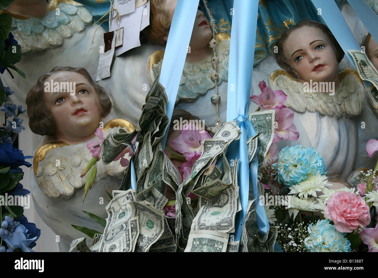 Italian parade with money pinned on sashes of the religious icon Stock ...