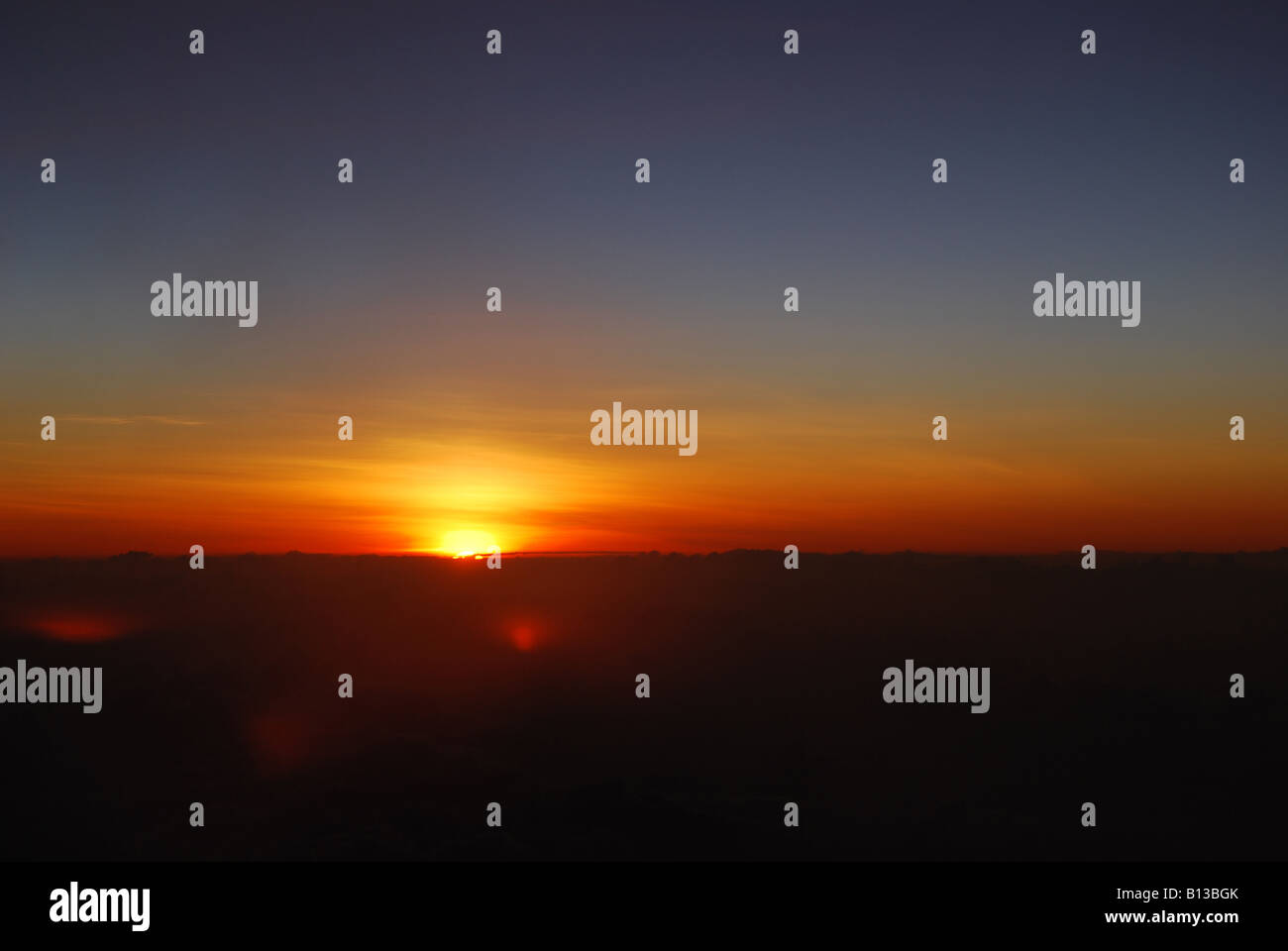 sunset crossing the atlantic ocean seen from a plane Stock Photo - Alamy