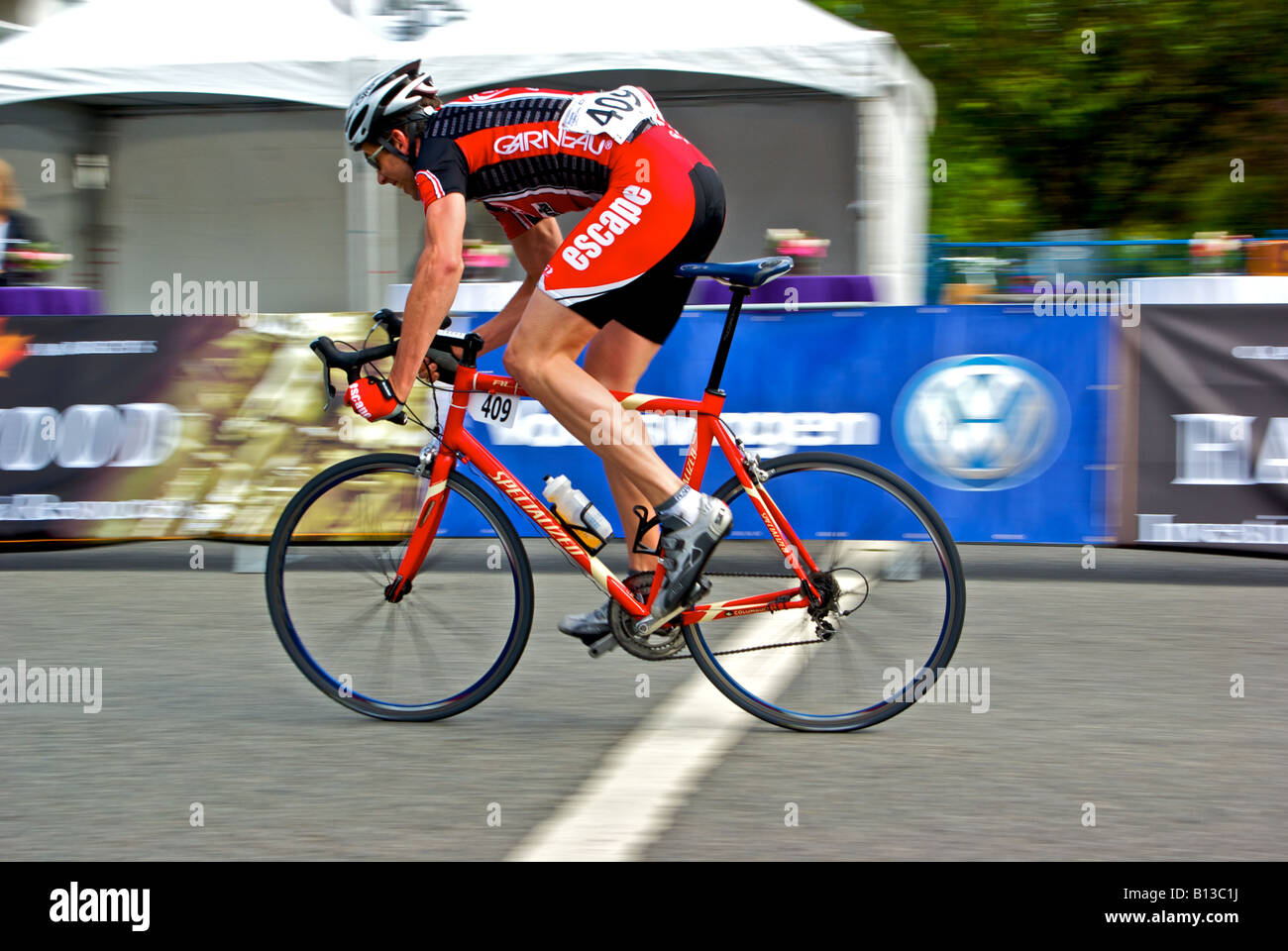 Male bicycle race competitor at speed Stock Photo - Alamy