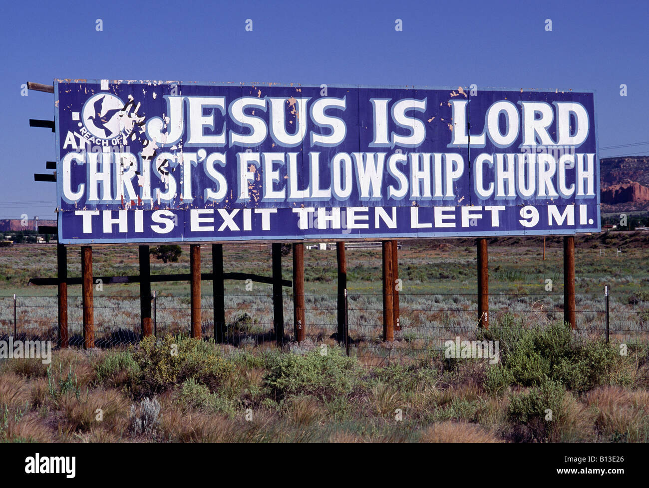 A billboard advertises a Christian church on the interstate highway in ...