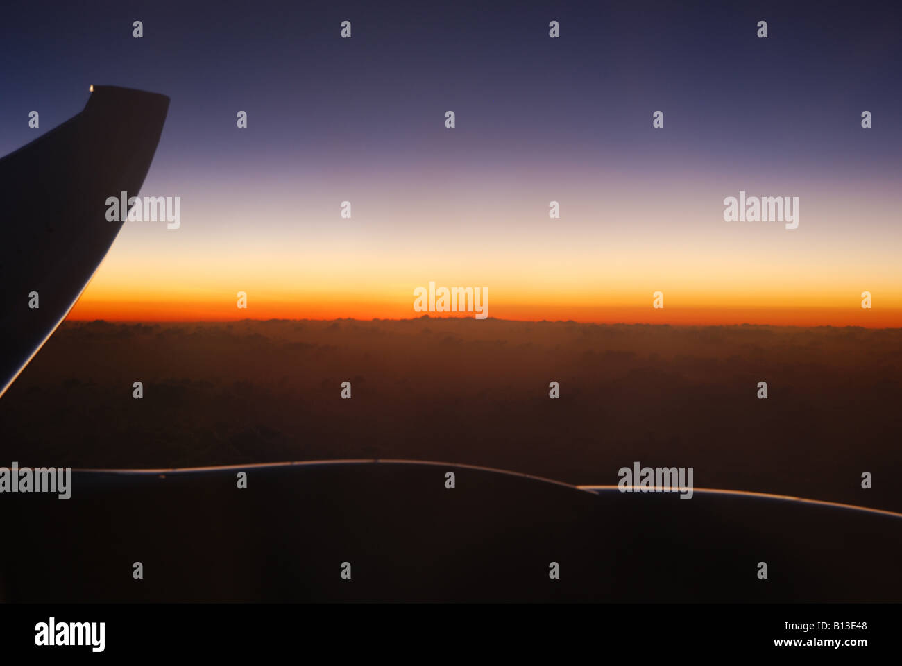 sunset crossing the atlantic ocean seen from a plane from Cayenne to ...